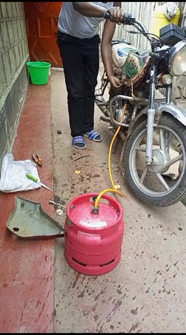 Using LPG gas to power motorcycle - YouTube