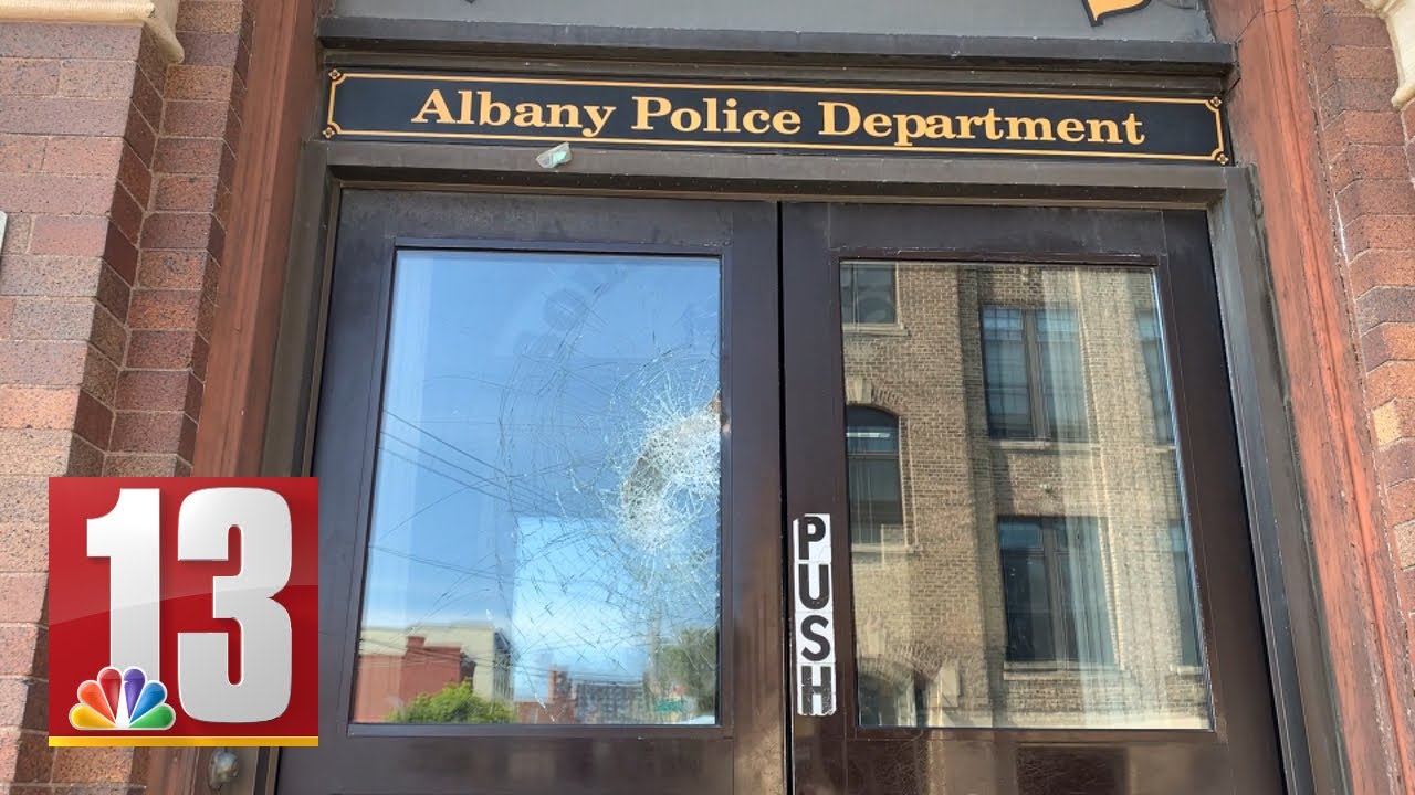 Brick thrown at window, squad cars outside Albany police station - YouTube