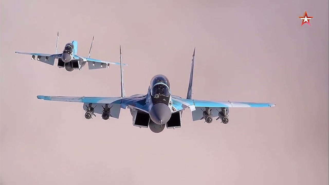 Great in flight footage of MiG-35S with MiG-35UB taken from An-26 cargo ...