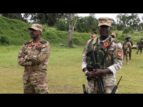 Special Forces Command (SFC) Commander Brig Gen. David Mugisha passes ...