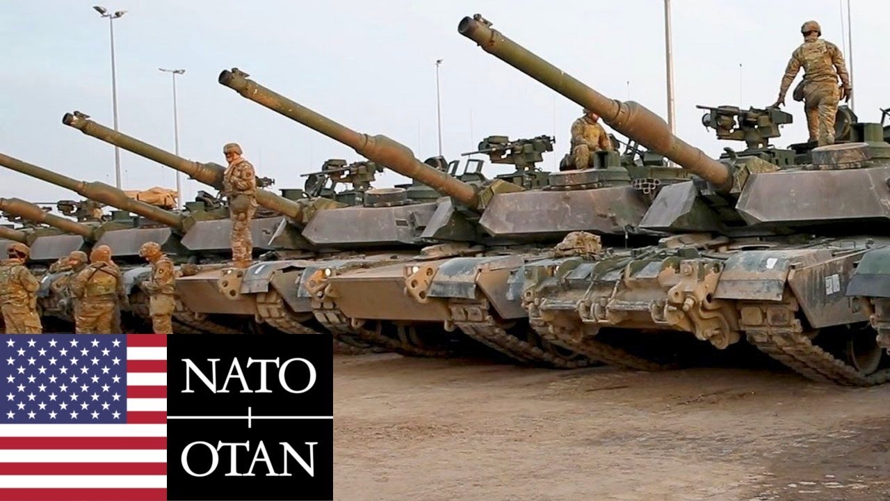 U.S. Army, NATO. Tanks and armored vehicles during military exercises ...