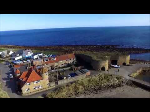 Aerial footage of Beadnell Bay and Seahouses - YouTube