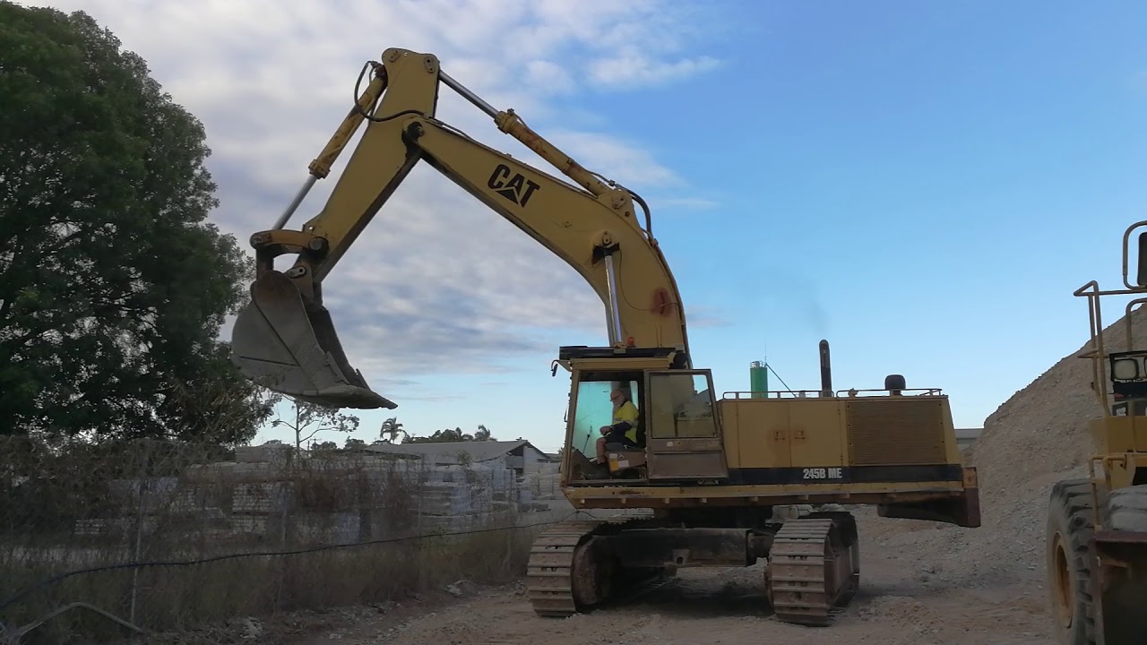CAT 245B ME Excavator - Walking - YouTube