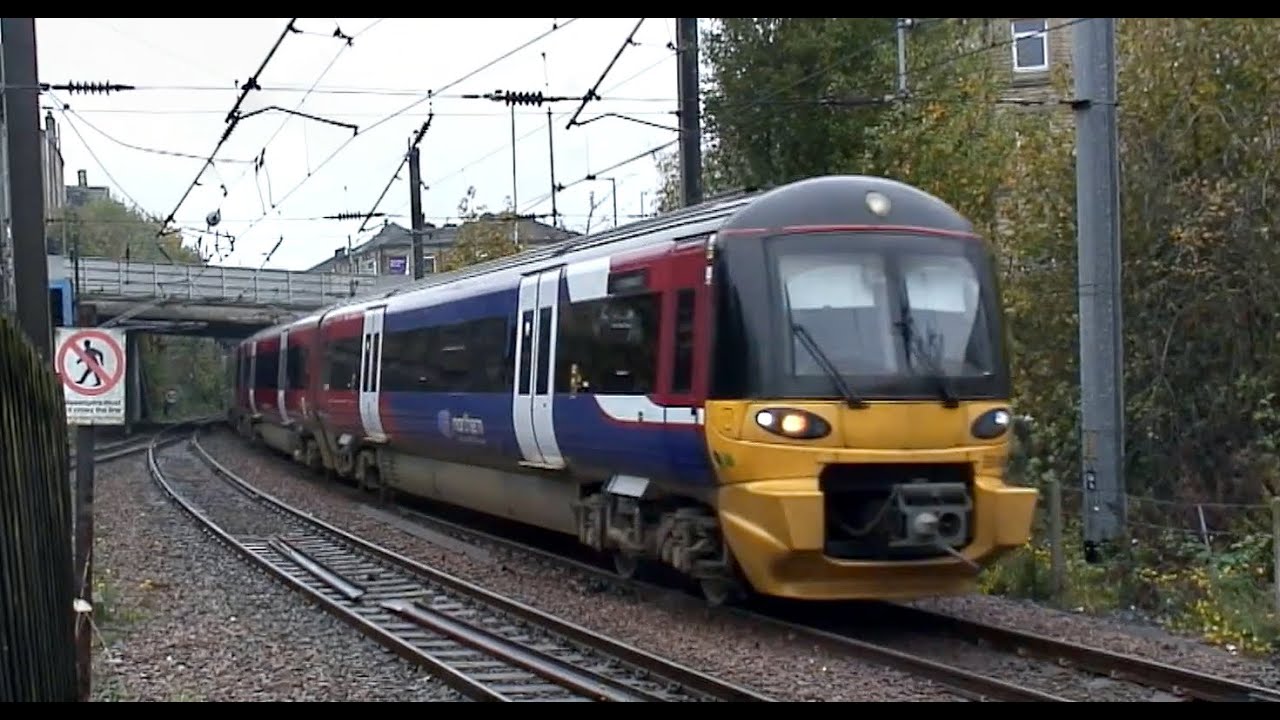 Class 333's at Shipley, then over the S&C by 158/153. - YouTube