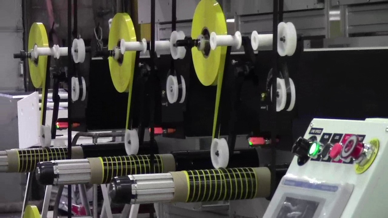 Advanced Composite Slitting and Spooling - YouTube