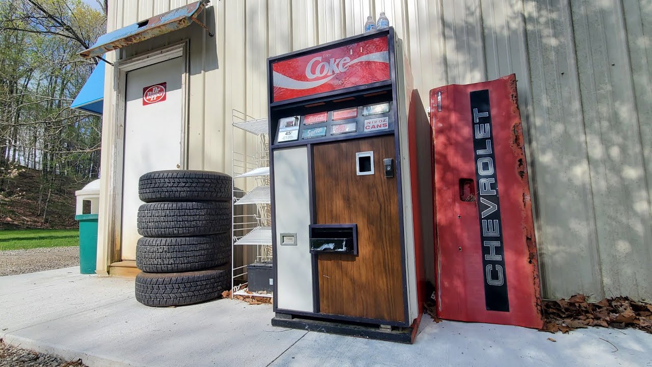Breaking into a Coke Machine. How easy is it to open a locked pop ...
