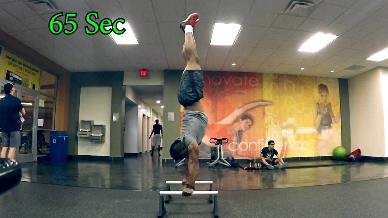 WORLD RECORD !!! 65 SEC HANSTAND HOLD | ON P BARS - YouTube