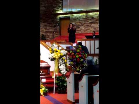 Rainey Harris sings at Pillow's funeral