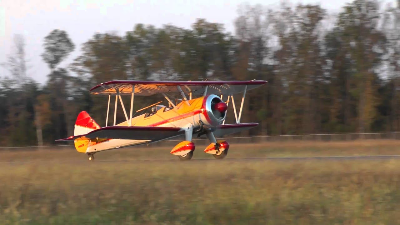 Stearman, N450JW Low Pass, slip then landing at KHWY on 101010 at 1819 ...