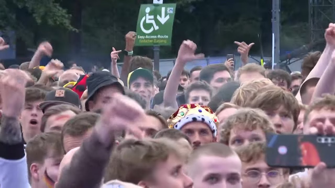 Soccer Germany vs Scotland : German fans in a Berlin fan zone cheer ...