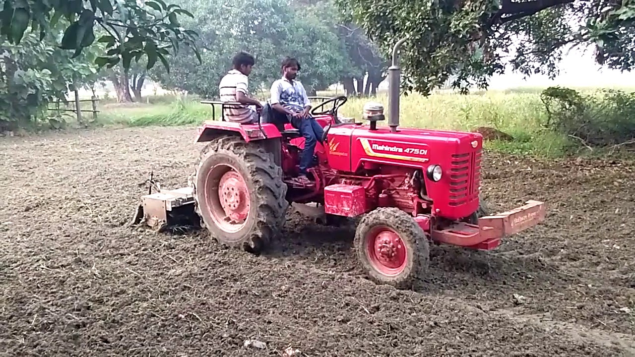 plowing the fields with rotavator - YouTube