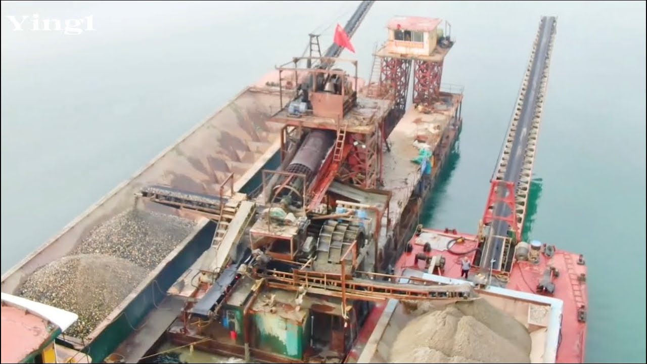 Barge mining Cobblestone and sand in the river ! The view of the river ...