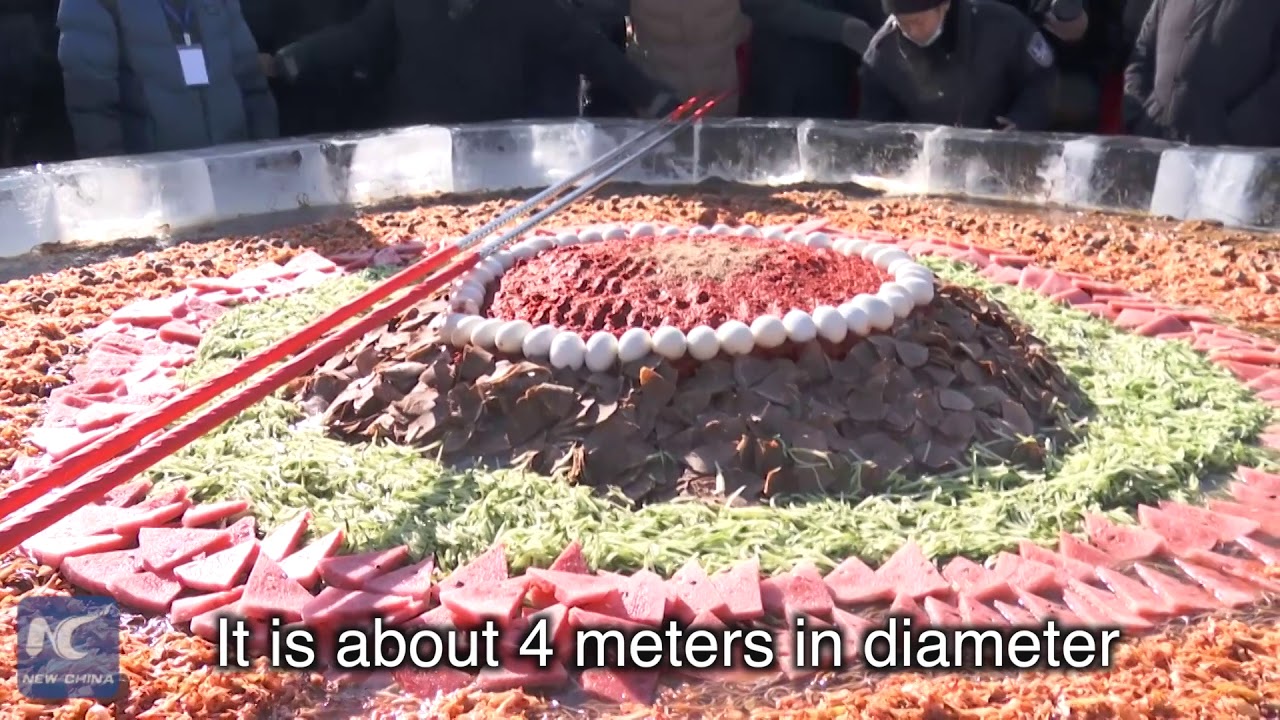 GIANT ice bowl of noodles served on frozen river - YouTube