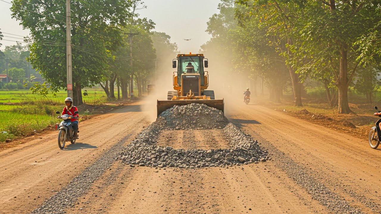Bulldozer and Motorcyclists on a Dusty Path in Southeast Asia, Midday ...