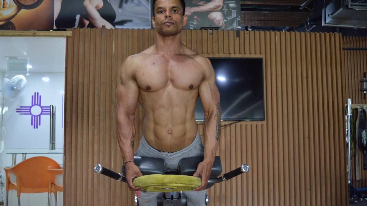 How to do Hyperextensions - Back Extensions using weights - YouTube