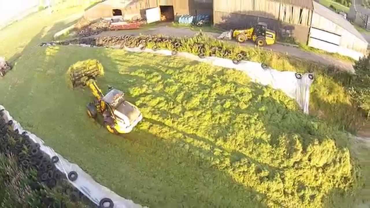 Silage pit and a forage wagon - YouTube