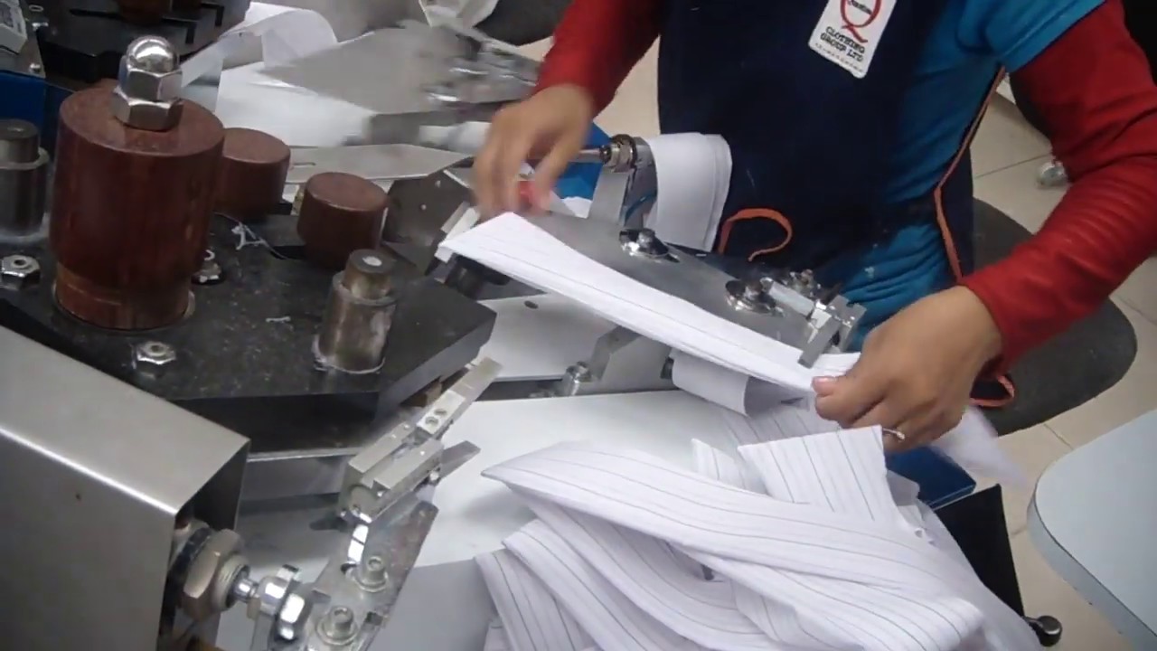 AUTOMATIC COLLAR TRIM, TURN & PRESS MACHINE - YouTube
