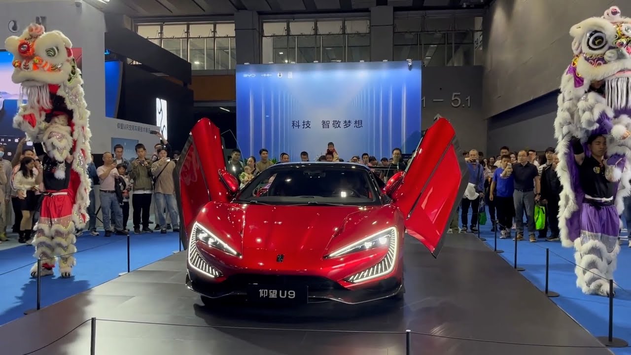 BYD Yangwang U9 performs alongside a lion dance - YouTube