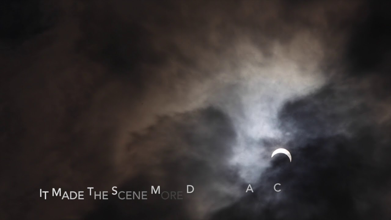 Solar Eclipse As Seen Through Rain Clouds - YouTube