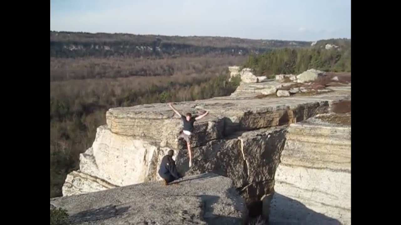 Kid almost falls off a cliff but friend catches him and saves his life ...