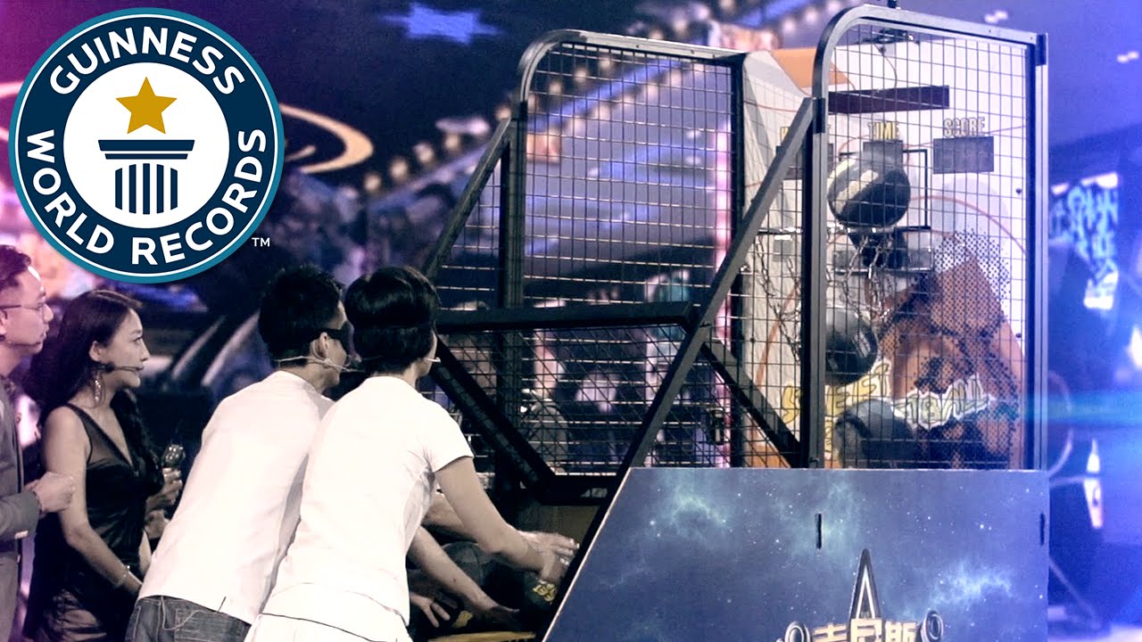 Most miniature basketball shots while blindfolded - Guinness World ...