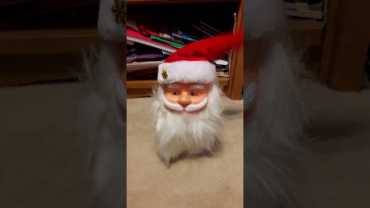 Knock-off animated singing Santa head - YouTube
