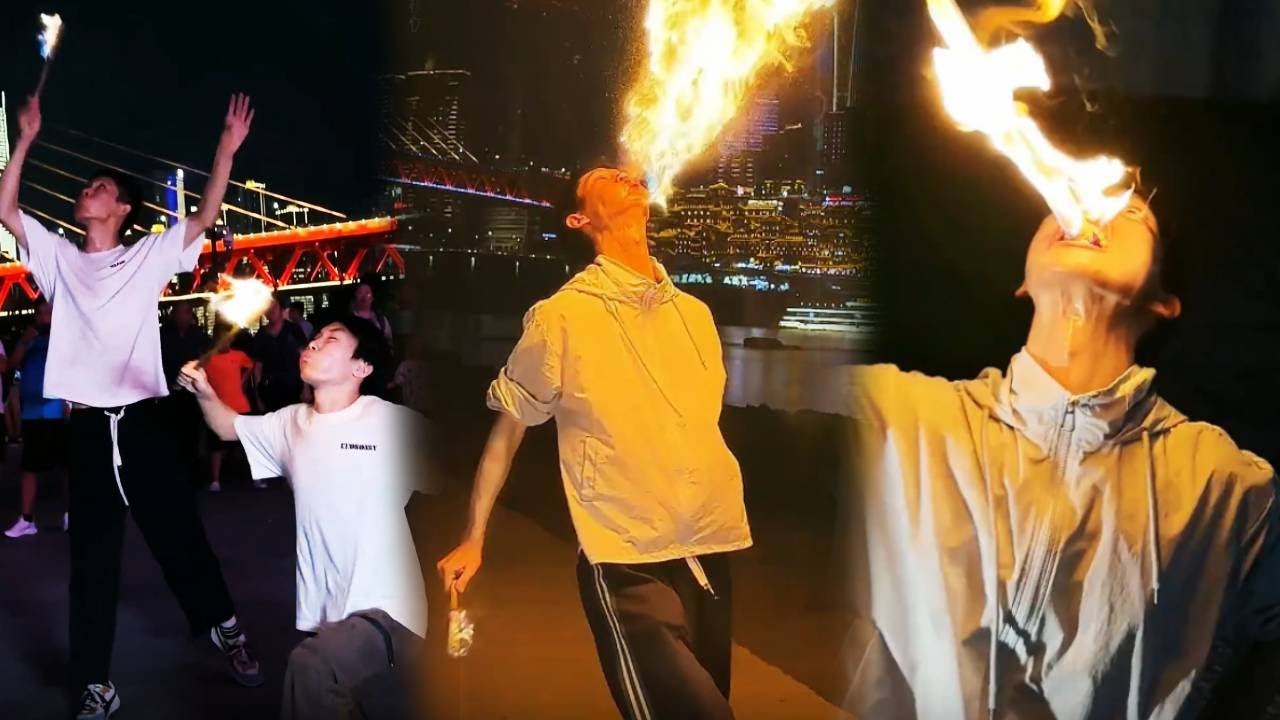 A Young Man Performs Fire-Breathing Stunts On The Street! Intangible ...