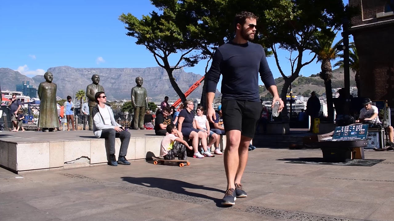 Street musician Reinhardt Buhr performing in Cape Town, South Africa ...