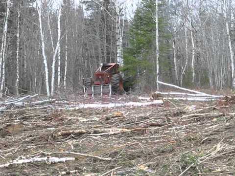 Peigne avec timberjack 230D / brushrake on 230D timberjack - YouTube
