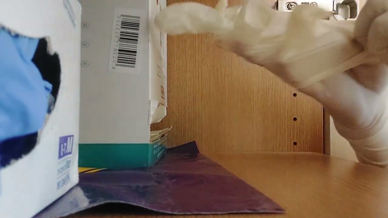 4 layers of surgical/examination latex/nitrile gloves - YouTube