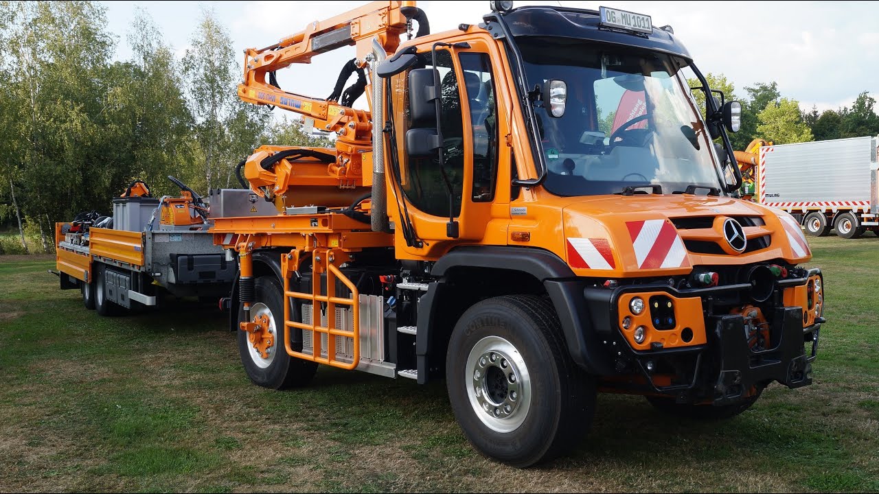 Unimog U430 mit Mähkopf von der Pritsche, Mähtüre und Mulag ...