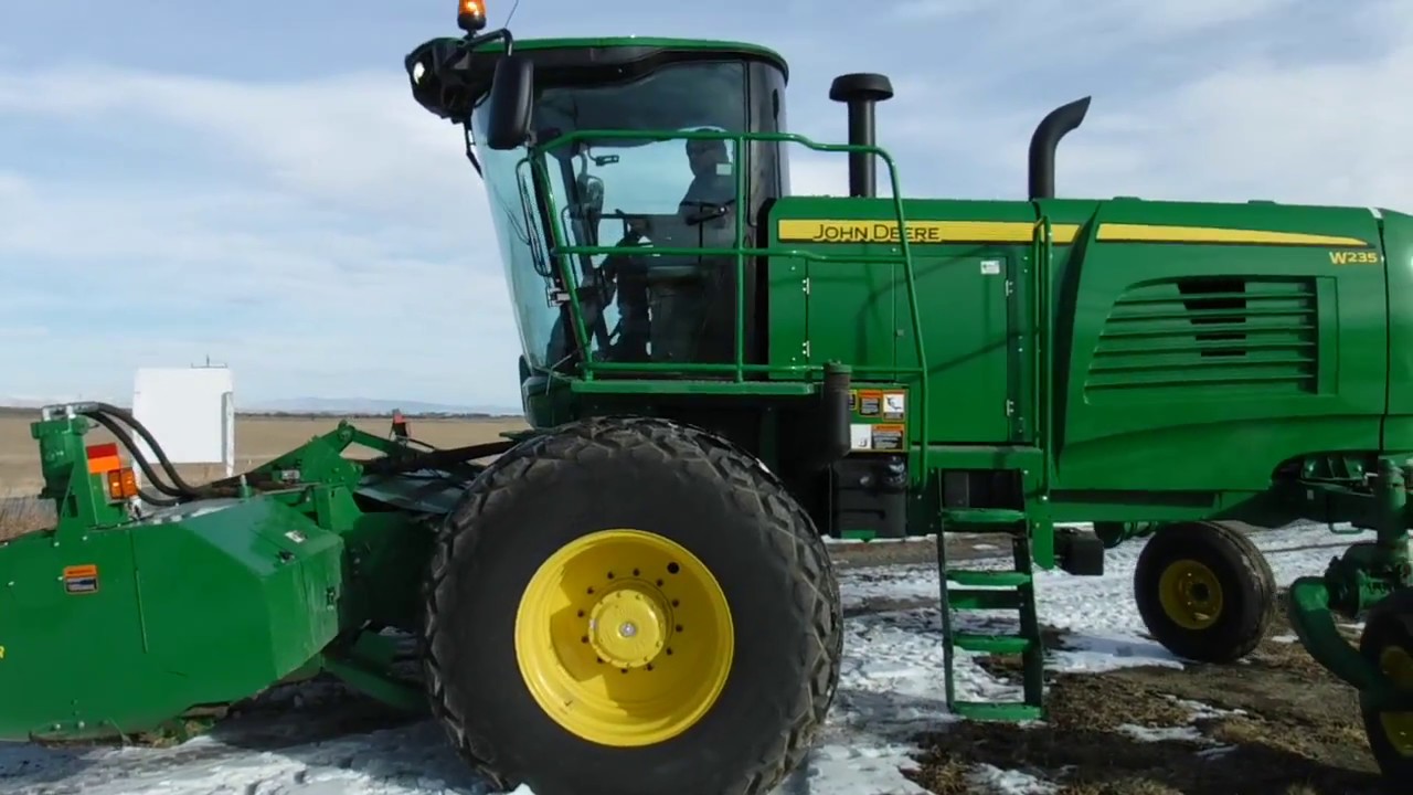 2014 John Deere W235 16' Disk Header Windrower - YouTube