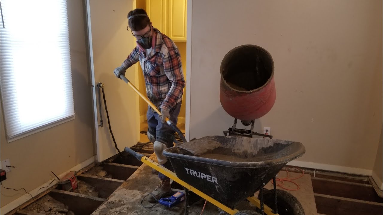 Digging crawlspace and pouring 350 bags of concrete - YouTube