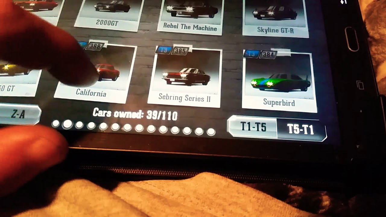 Larry Cassar playing CSR Classic drag racing games - YouTube