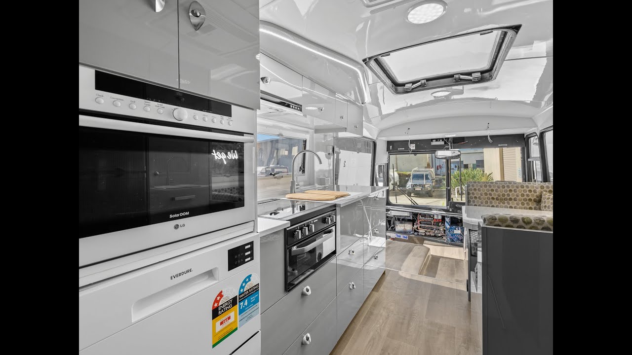 Converting a Bus To A Recreational Vehicle at Oz Caravan World - YouTube