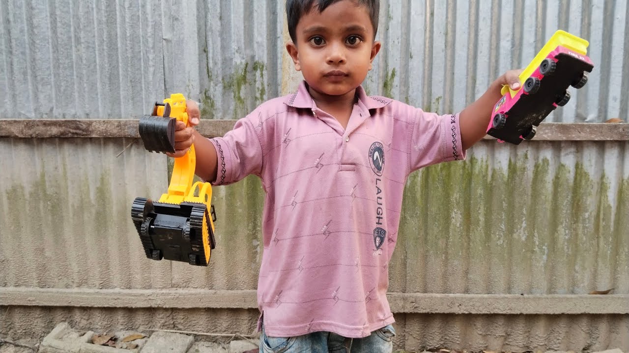 Saim play by vecu and truck she is soil cutting by vecu machine - YouTube