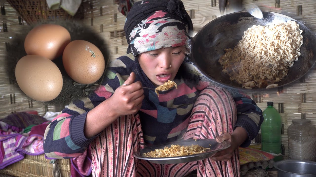 Manjita cooking egg noodles in her goat shed - YouTube