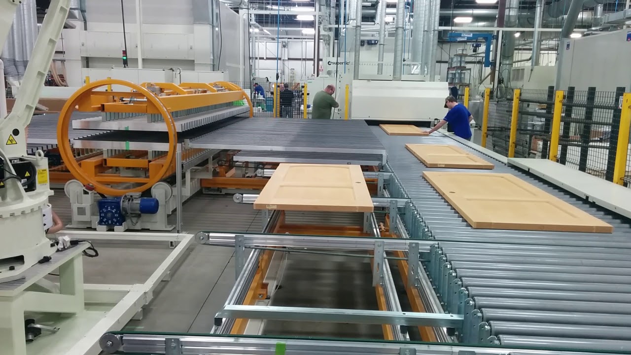 Robotic Loading of Doors into High Speed Finishing Line - YouTube