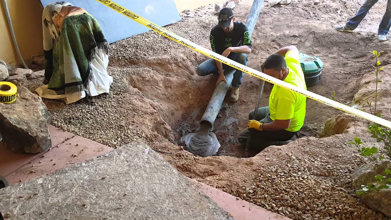 Filling a Septic Tank with concrete instead of removing it. - YouTube