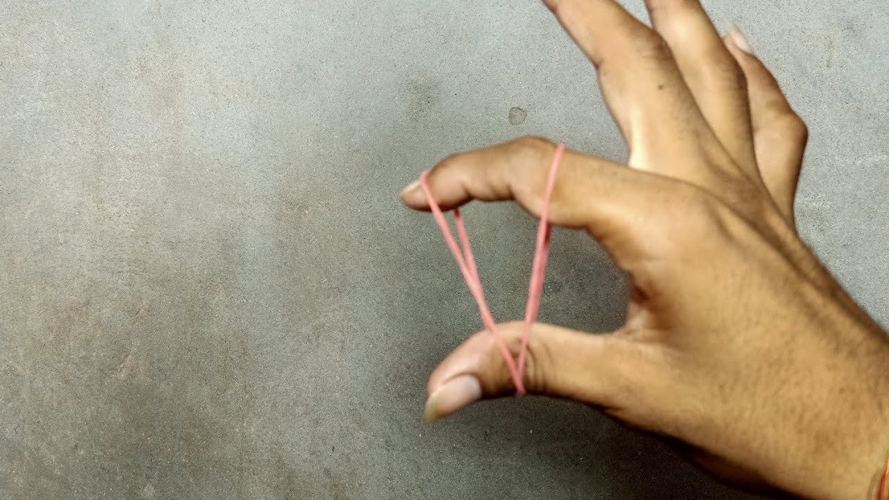 Easy rubber band magic trick - YouTube