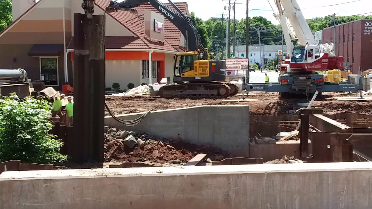 Crane removing huge steel barriers Skiff Street Bridge - YouTube