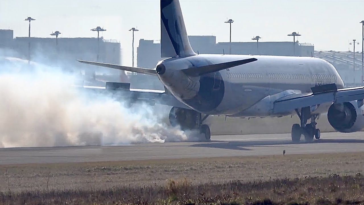 Plane Lands With Brake Malfunction - YouTube