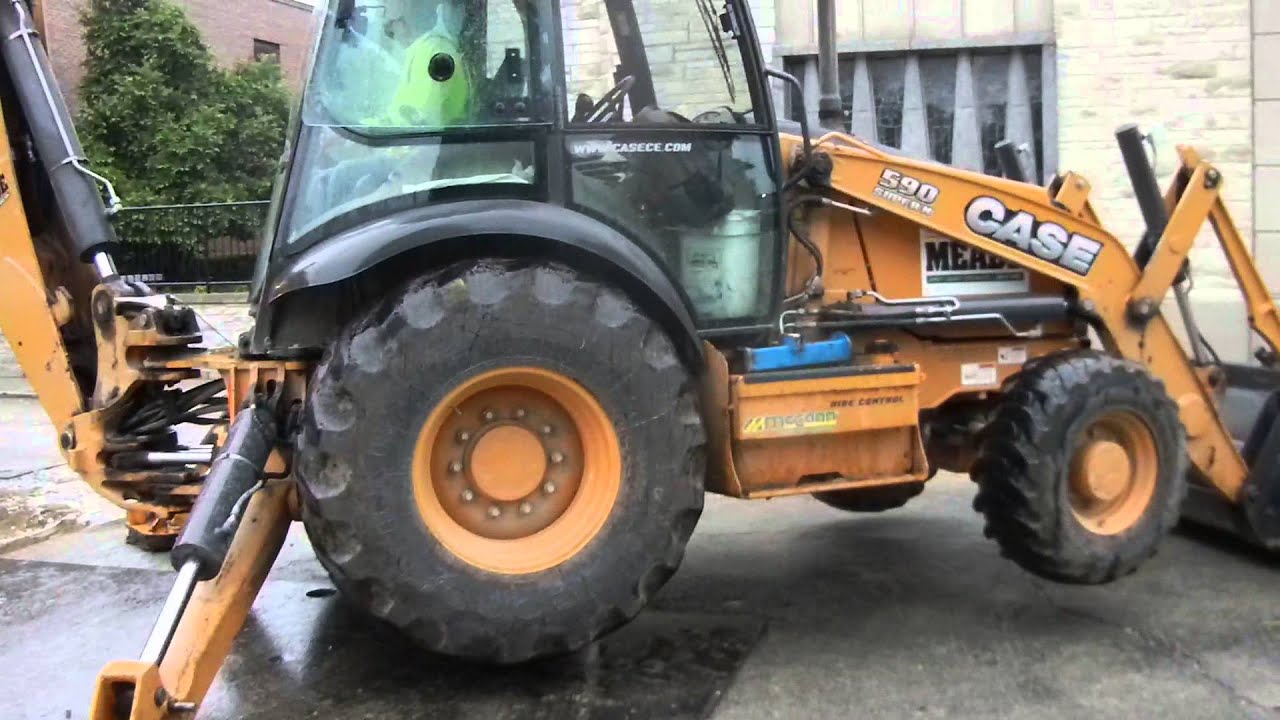 Case 590 Super N Backhoe Spreading Sand - YouTube