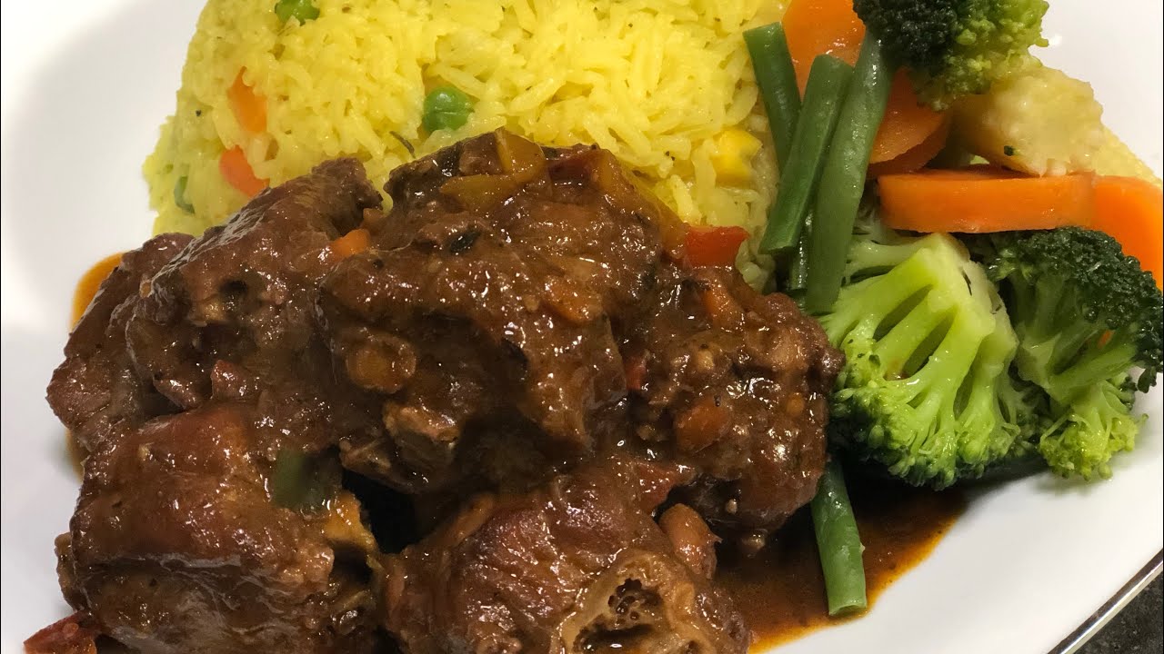 Brown stew turkey neck served with seasoned rice (Cooking with Bling ...