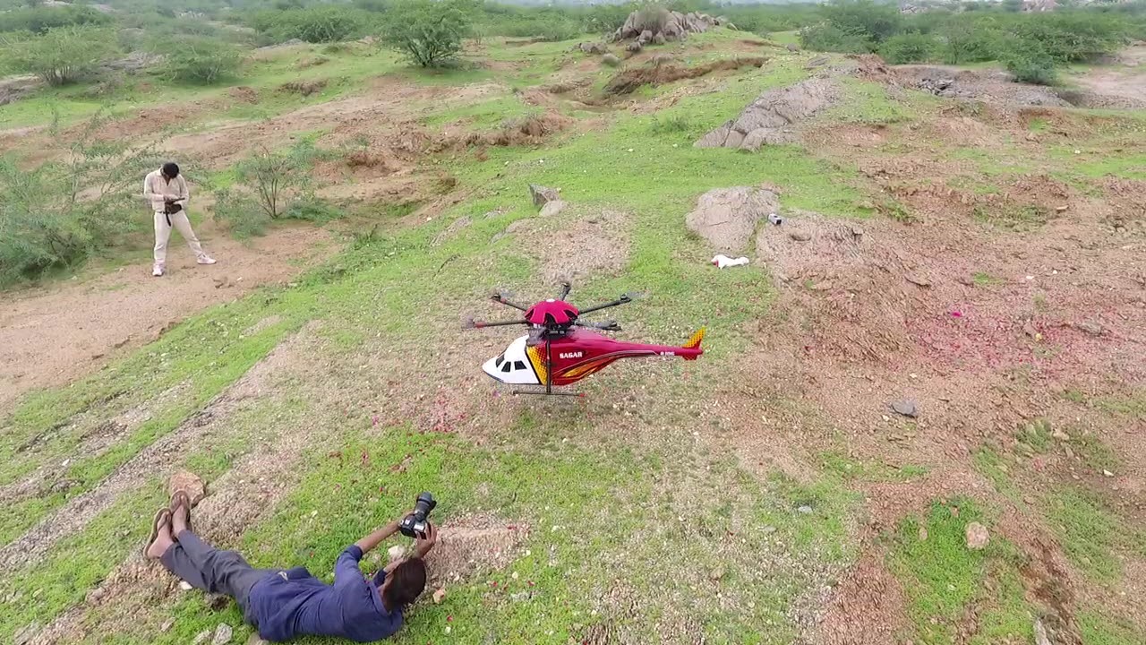 Flower drone helicopter car video shooting karte huye flower dropping ...