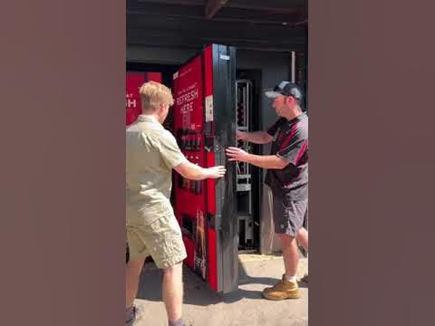 Robert Irwin saves Python from Vending Machine! - YouTube
