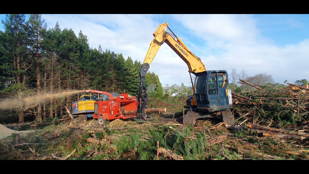 Morbark 18" Chipper cleaning up Forestry Logging waste - YouTube