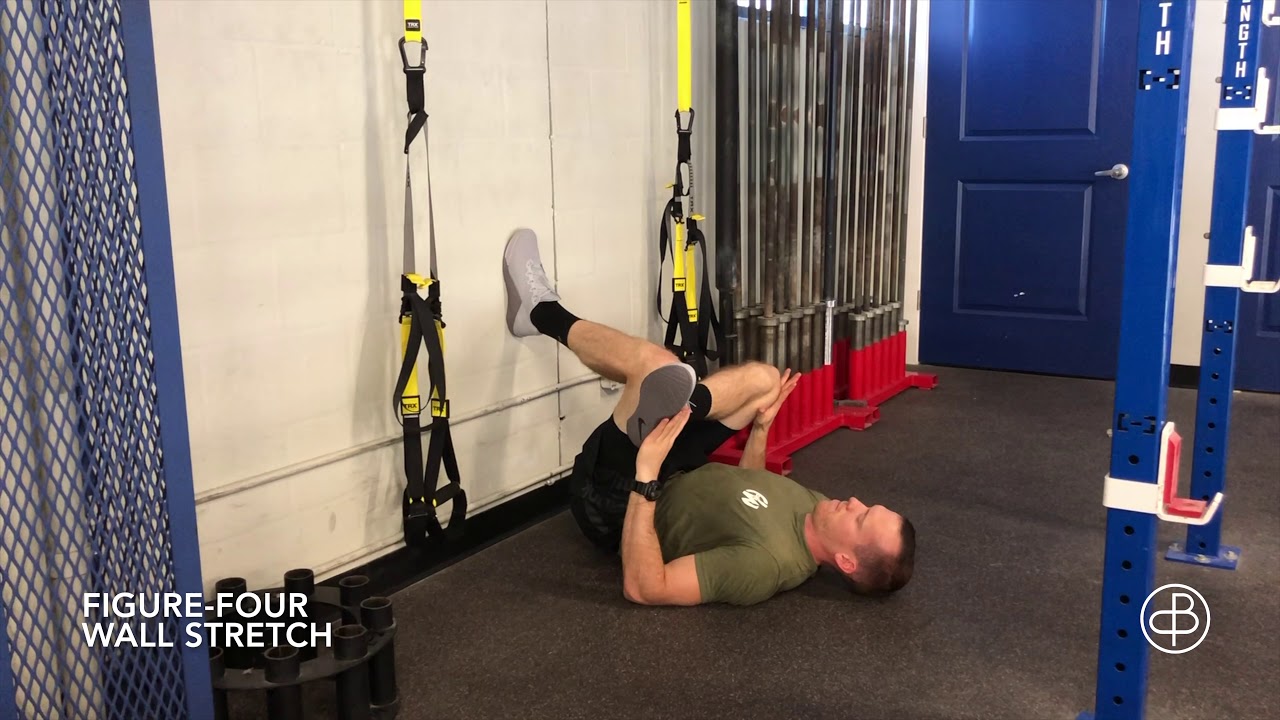 Figure-Four Wall Stretch - YouTube