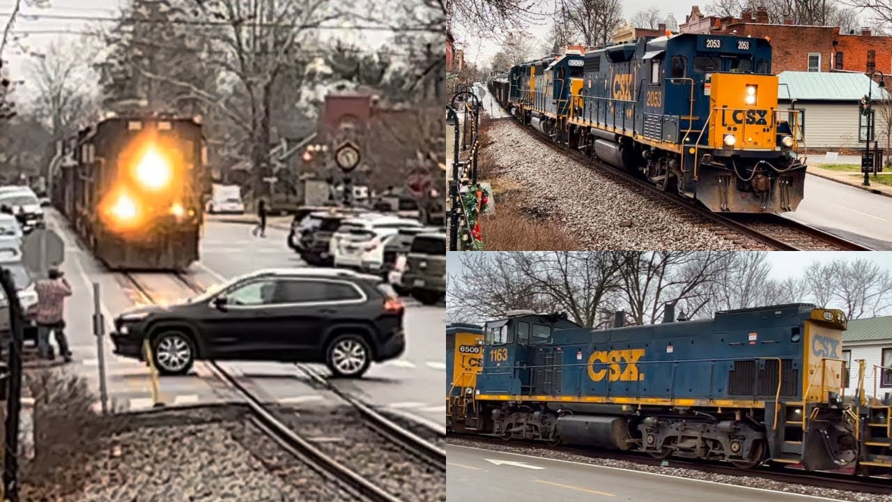 STREET RUNNING! Car pulls out in front of train, local freight rolls ...