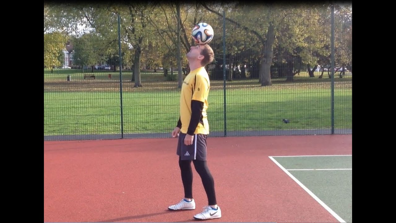 Slow-mo skills: Football head stall - YouTube